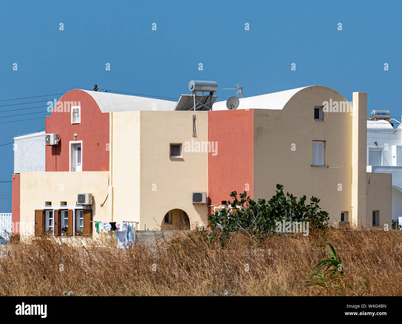 A colourful house in Greek architecture style Stock Photo - Alamy