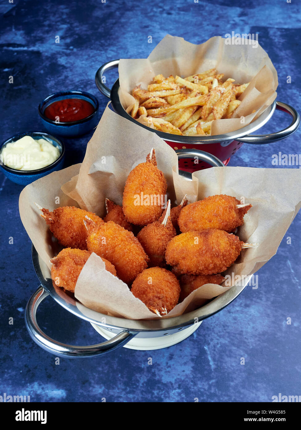 Deep fried breaded crab-flavored surimi, with french fries Stock Photo ...