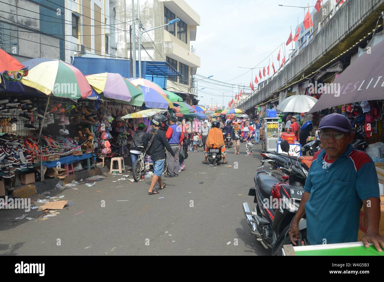 Jakarta, Indonesia - June 2019 : A view of people and street in Asemka ...