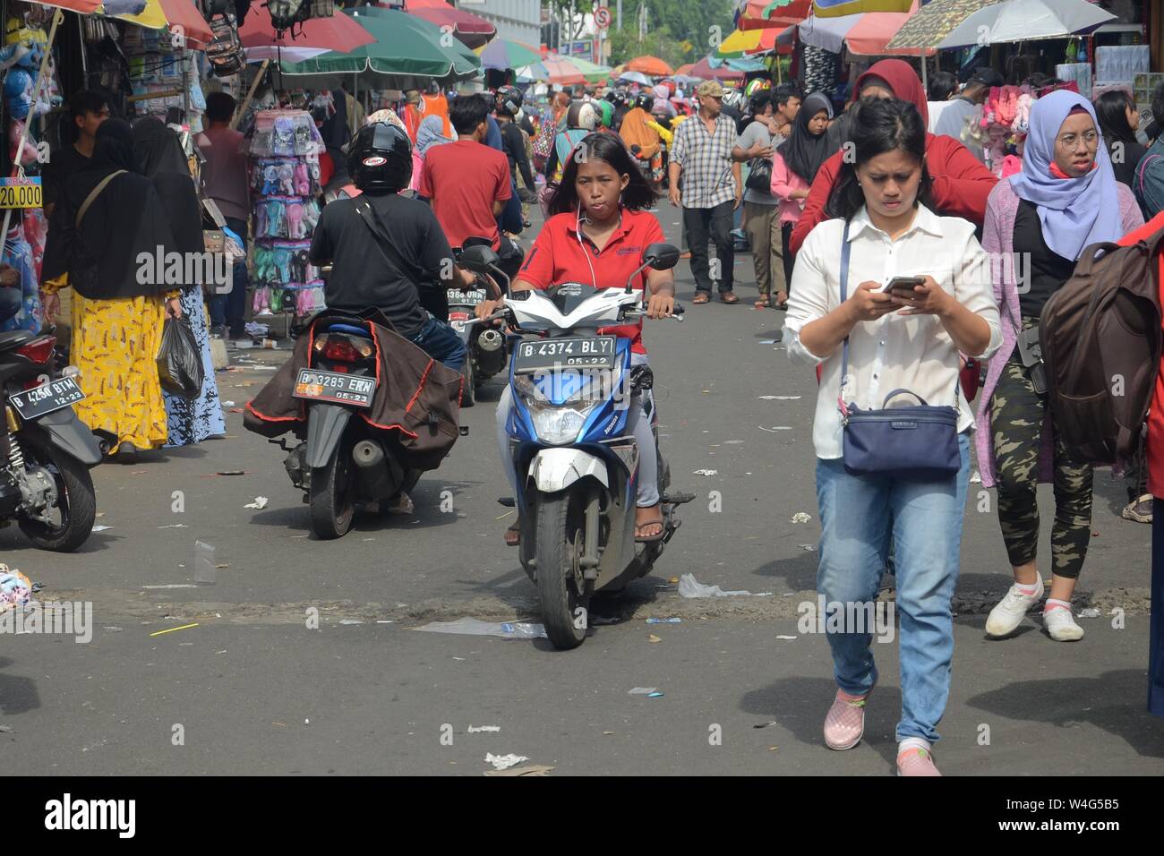 Jakarta, Indonesia - June 2019 : People use motorcycle in a crowded ...