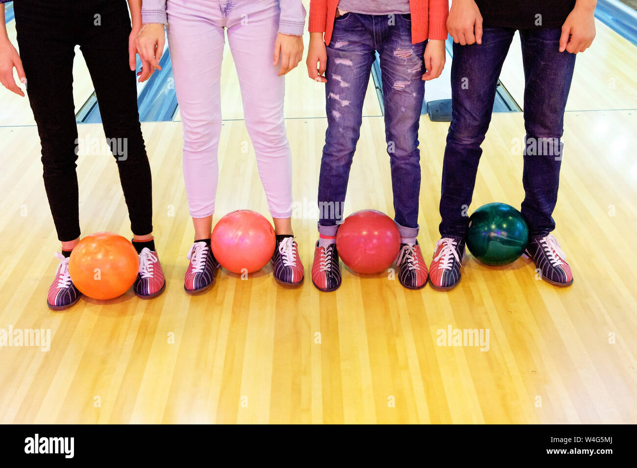 Group of friends at bowling - Young people having fun at bowling Stock ...