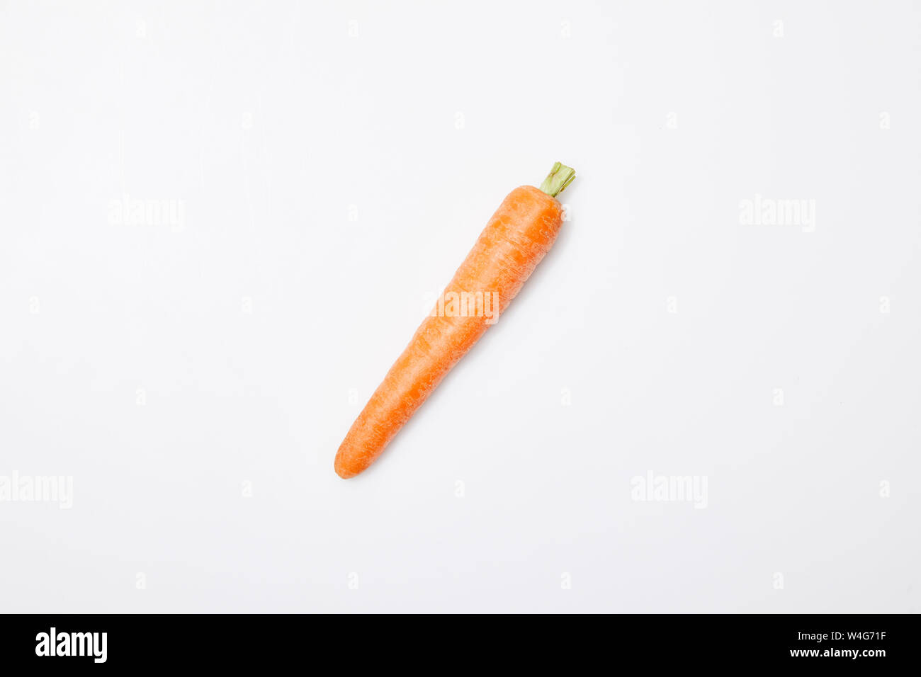 top view of organic carrot on white background Stock Photo - Alamy