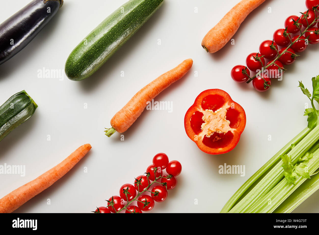 flat lay with fresh vegetables on green background, seamless pattern ...