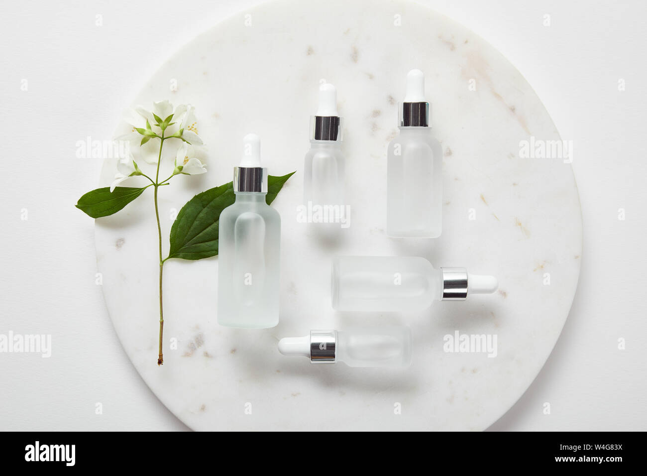 Cosmetic glass bottles on hi-res stock photography and images - Alamy