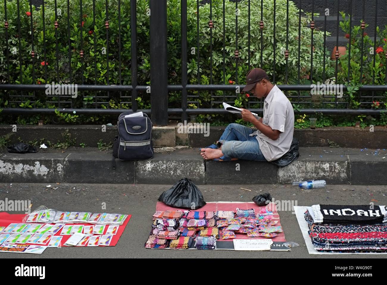 Jakarta, Indonesia - June 2019 : Street seller in Asemka Market ...