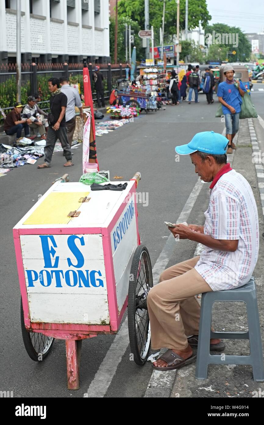 Jakarta, Indonesia - June 2019 : Street seller in Asemka Market ...