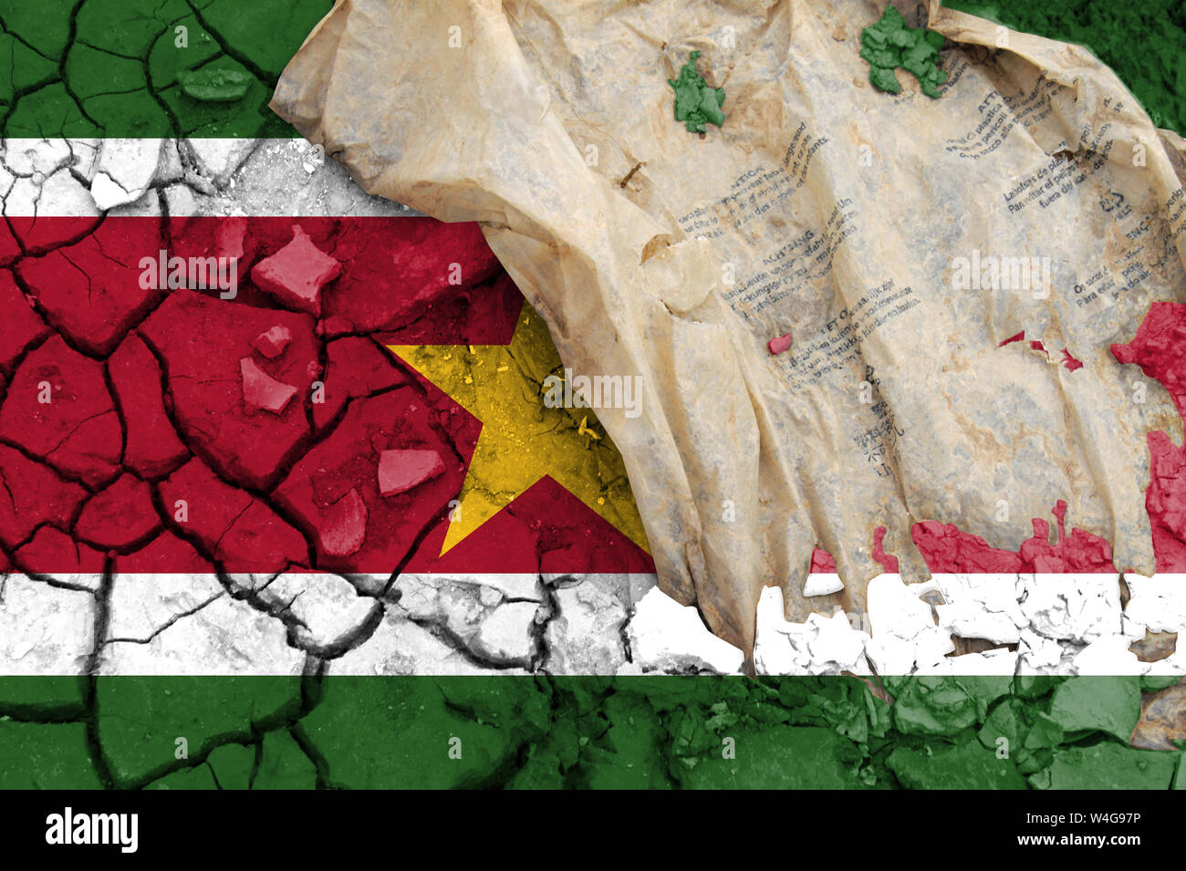 The flag of Suriname, the flag is depicted on cracked earth. Ecology ...