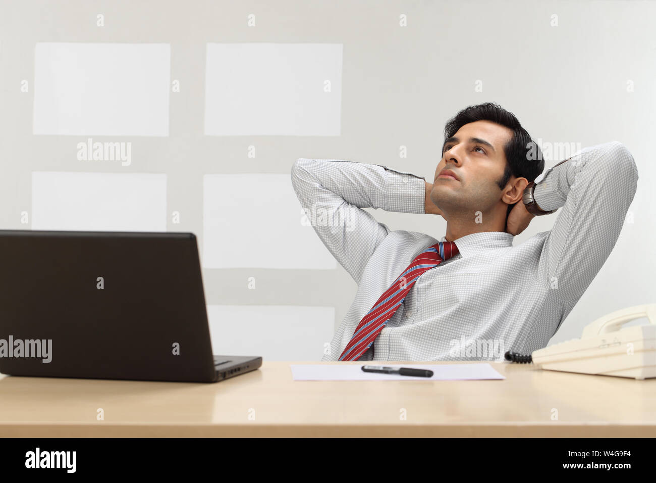 Man sitting down office getting up hi-res stock photography and images ...