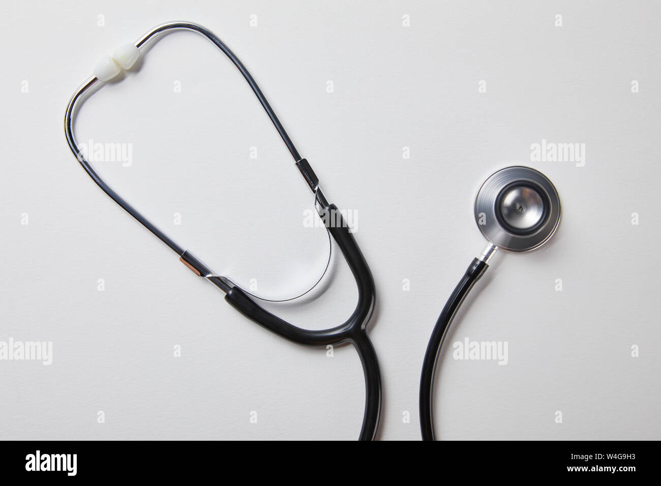 top view of medical black stethoscope isolated on white Stock Photo - Alamy