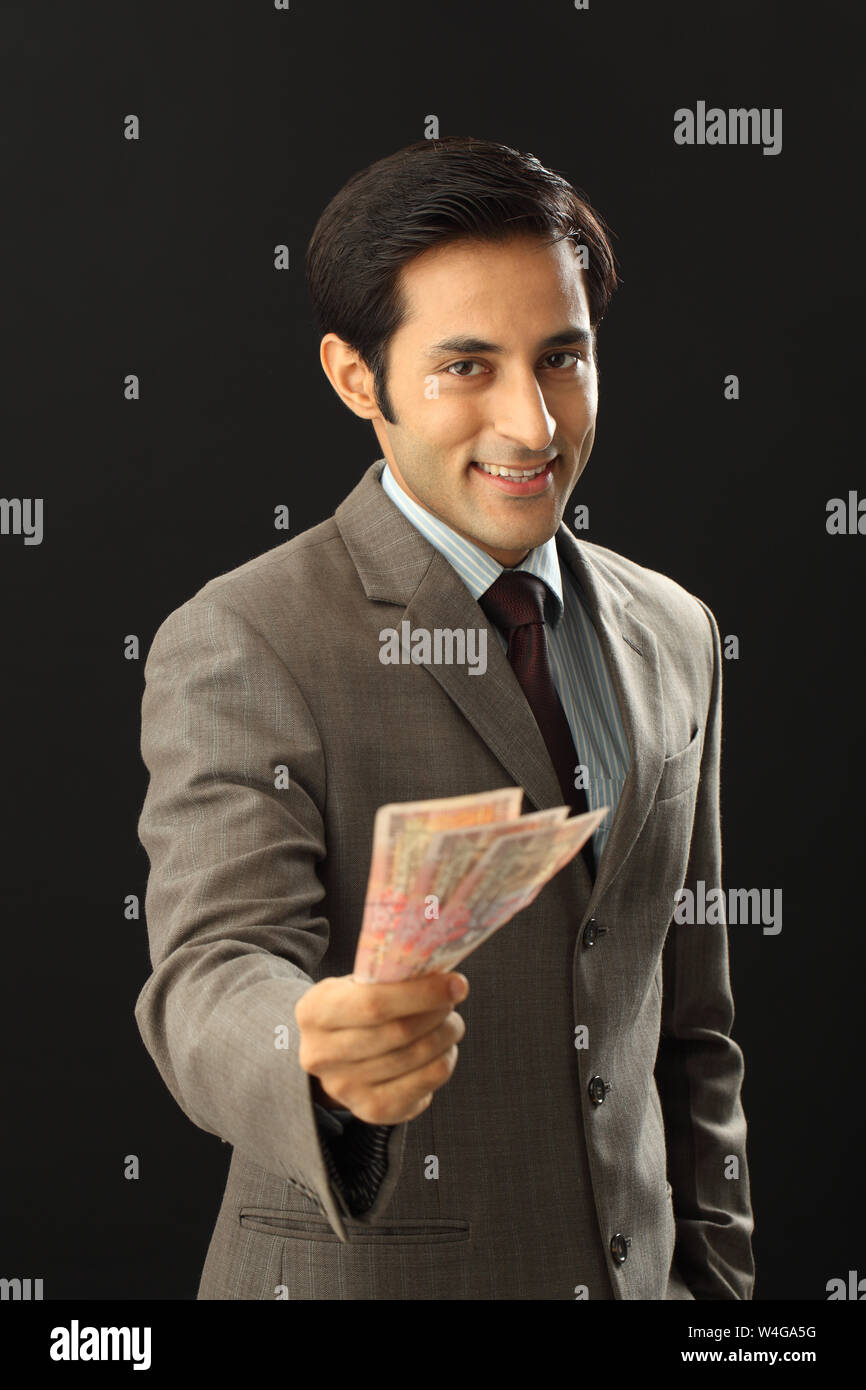 Rupee offering hi-res stock photography and images - Alamy