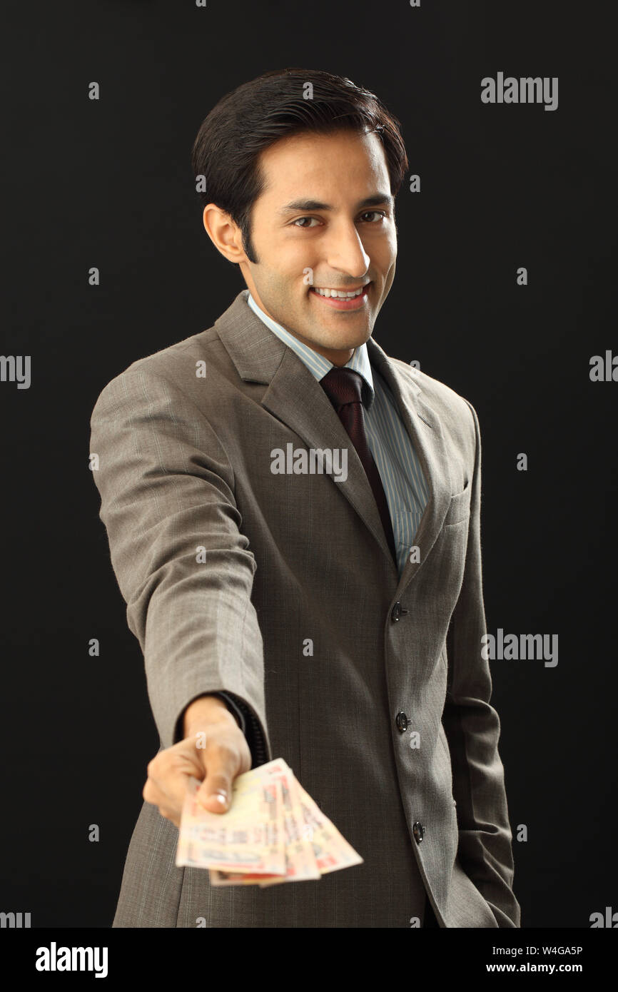 Rupee offering hi-res stock photography and images - Alamy