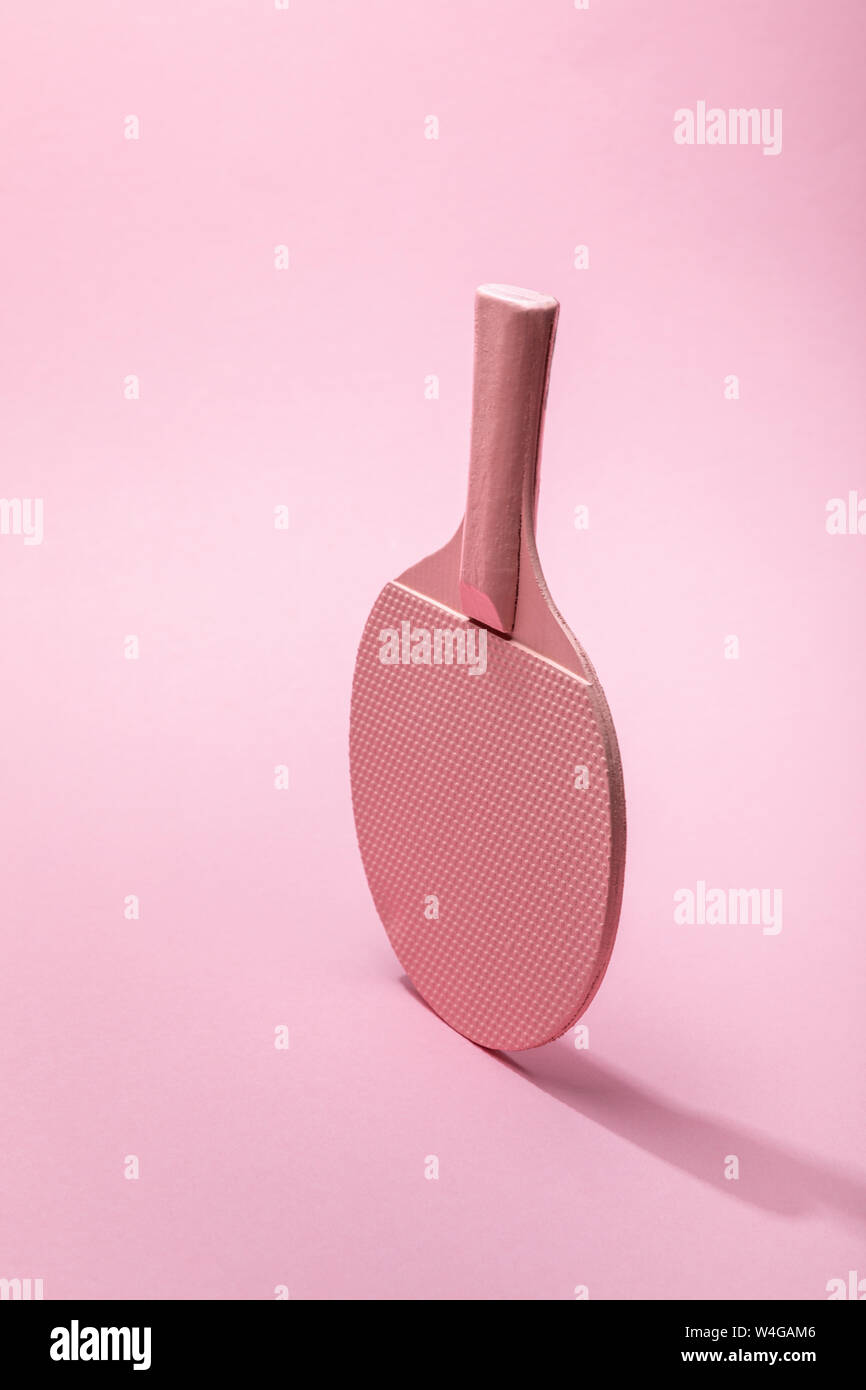 ping-pong racket on pink background with copy space Stock Photo - Alamy