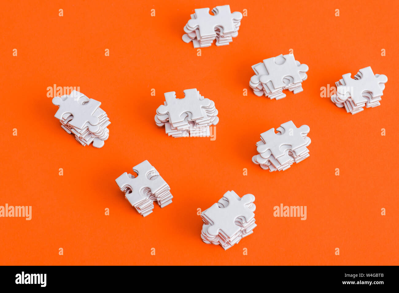 Stacked puzzle pieces hi-res stock photography and images - Alamy