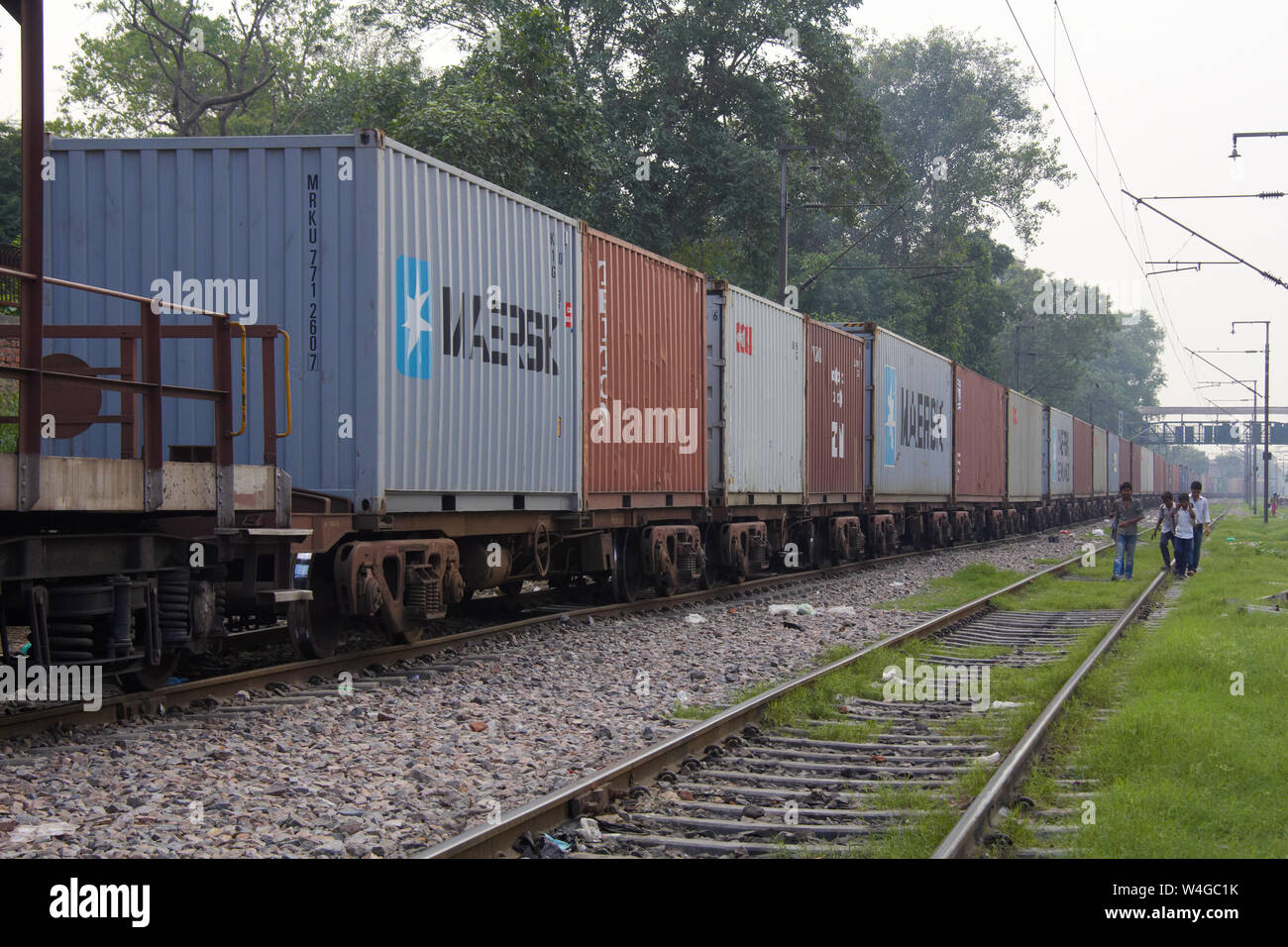 Freight train on railroad track, Delhi, India Stock Photo - Alamy