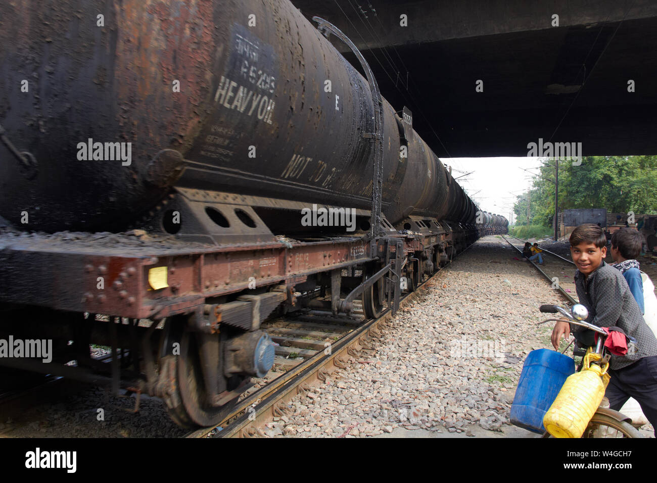 Freight train running on track, Delhi, India Stock Photo - Alamy