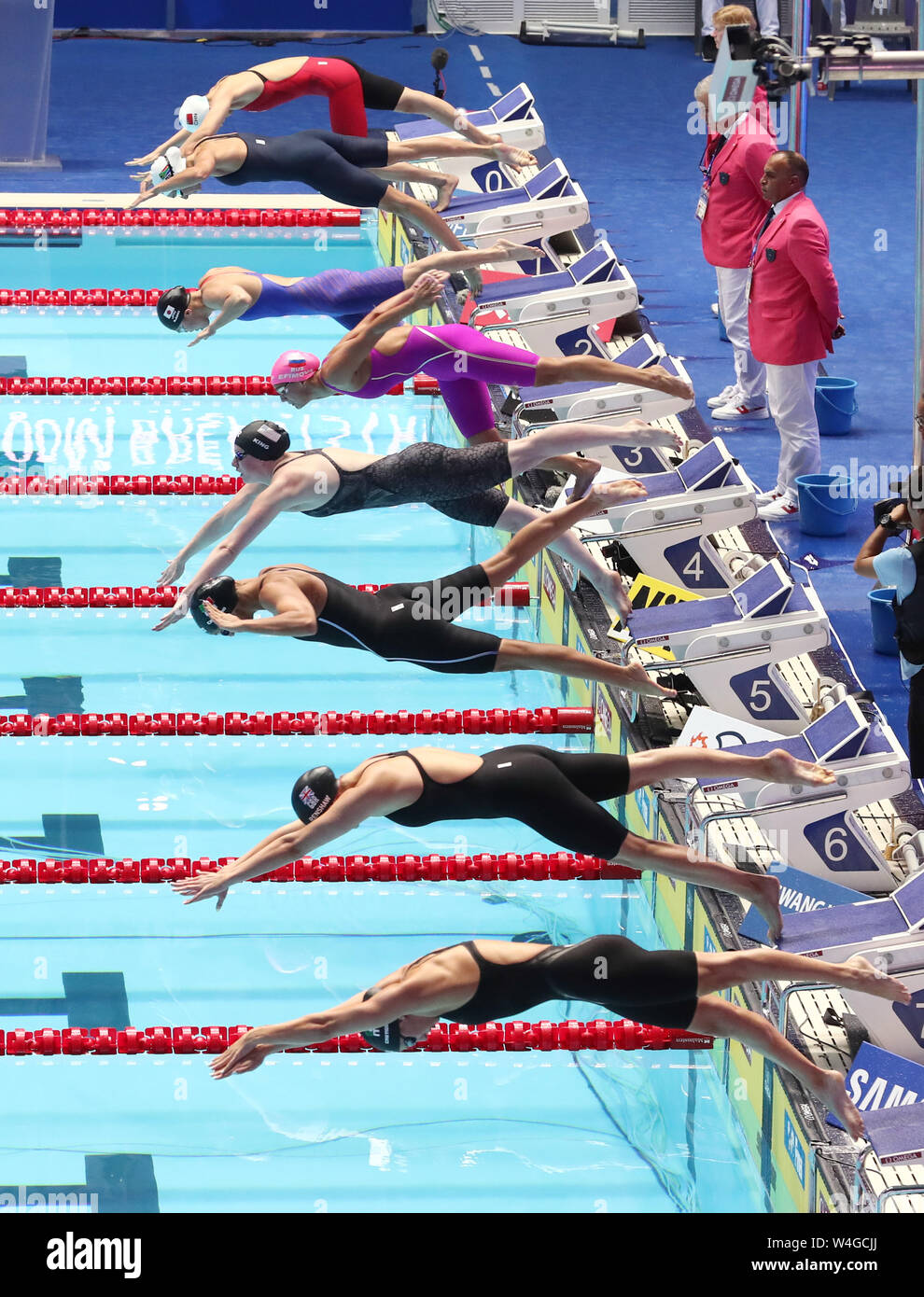 23rd July, 2019. Women's 100m breaststroke Swimmers jump in the water ...
