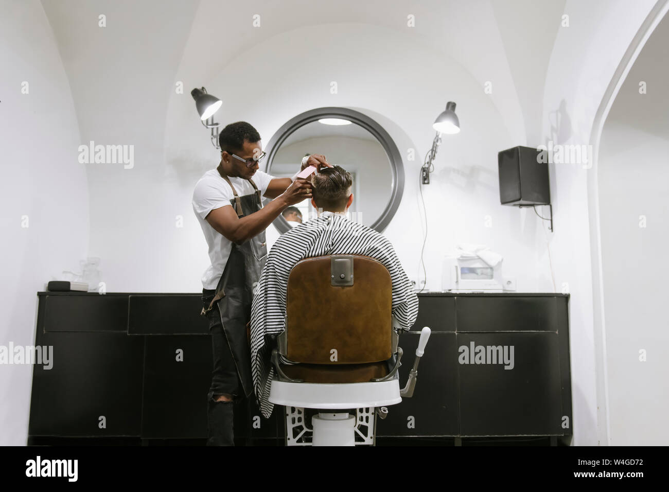 Working in barber shop hi-res stock photography and images - Alamy
