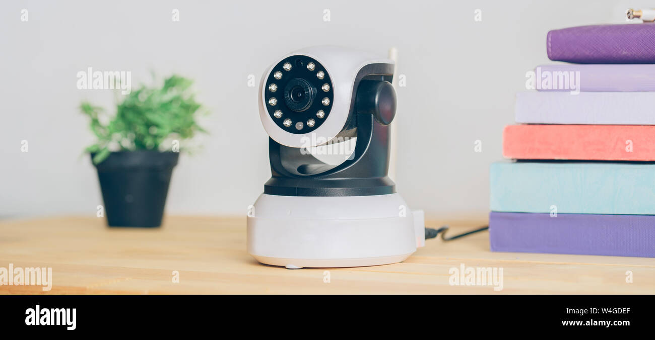 Security camera on Wood table. IP Camera Stock Photo - Alamy