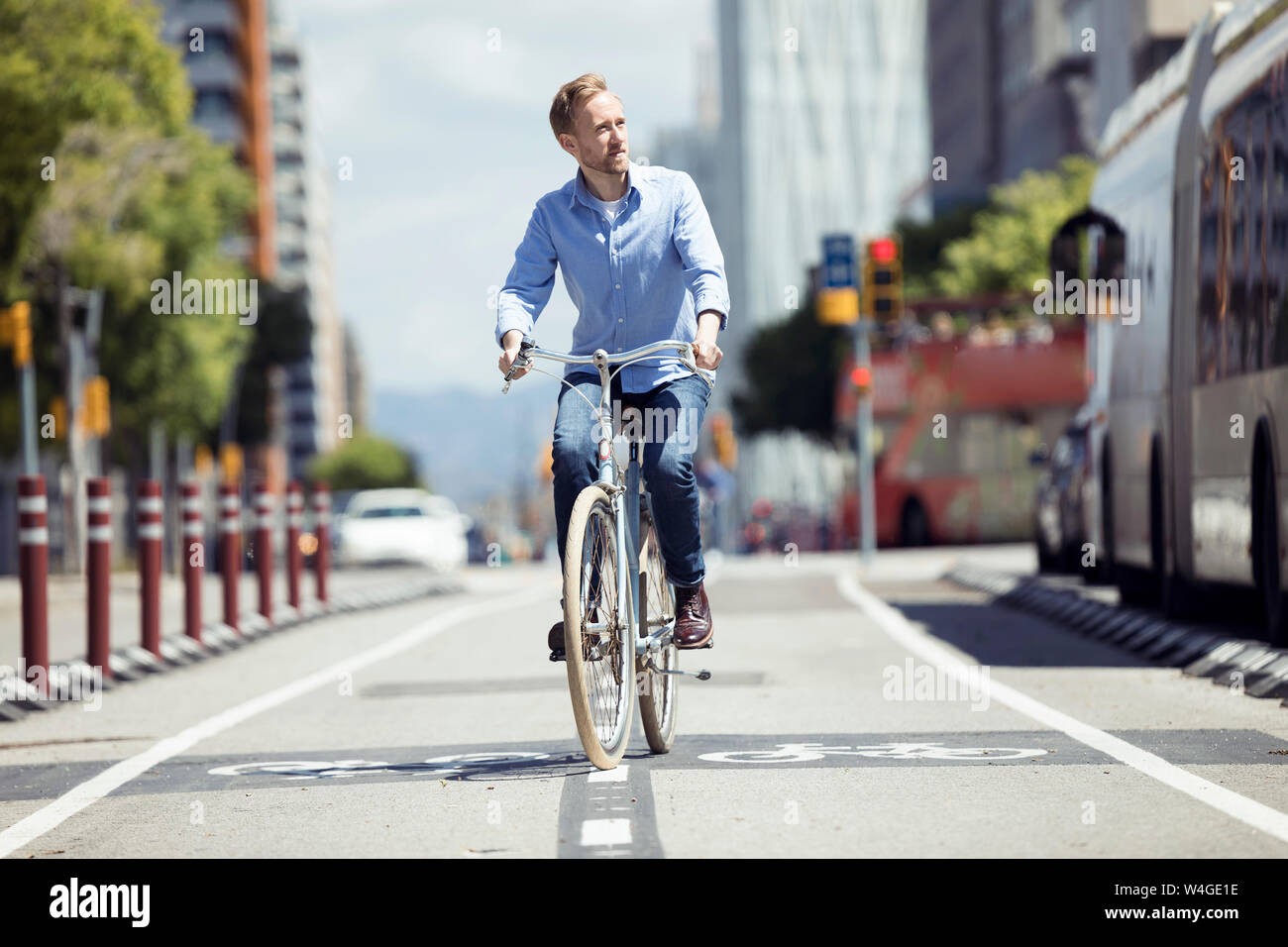 Man bike on road hi-res stock photography and images - Alamy