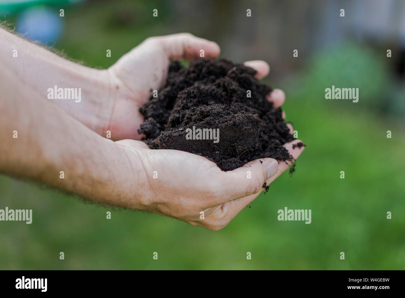 Holding soil hi-res stock photography and images - Alamy