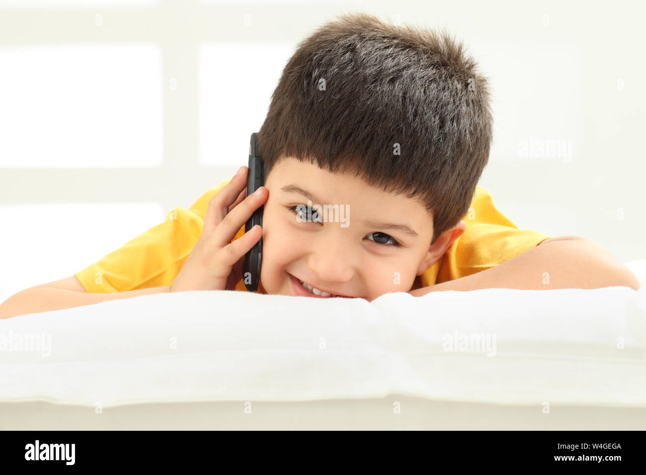Indian child boy phone talking hi-res stock photography and images - Alamy