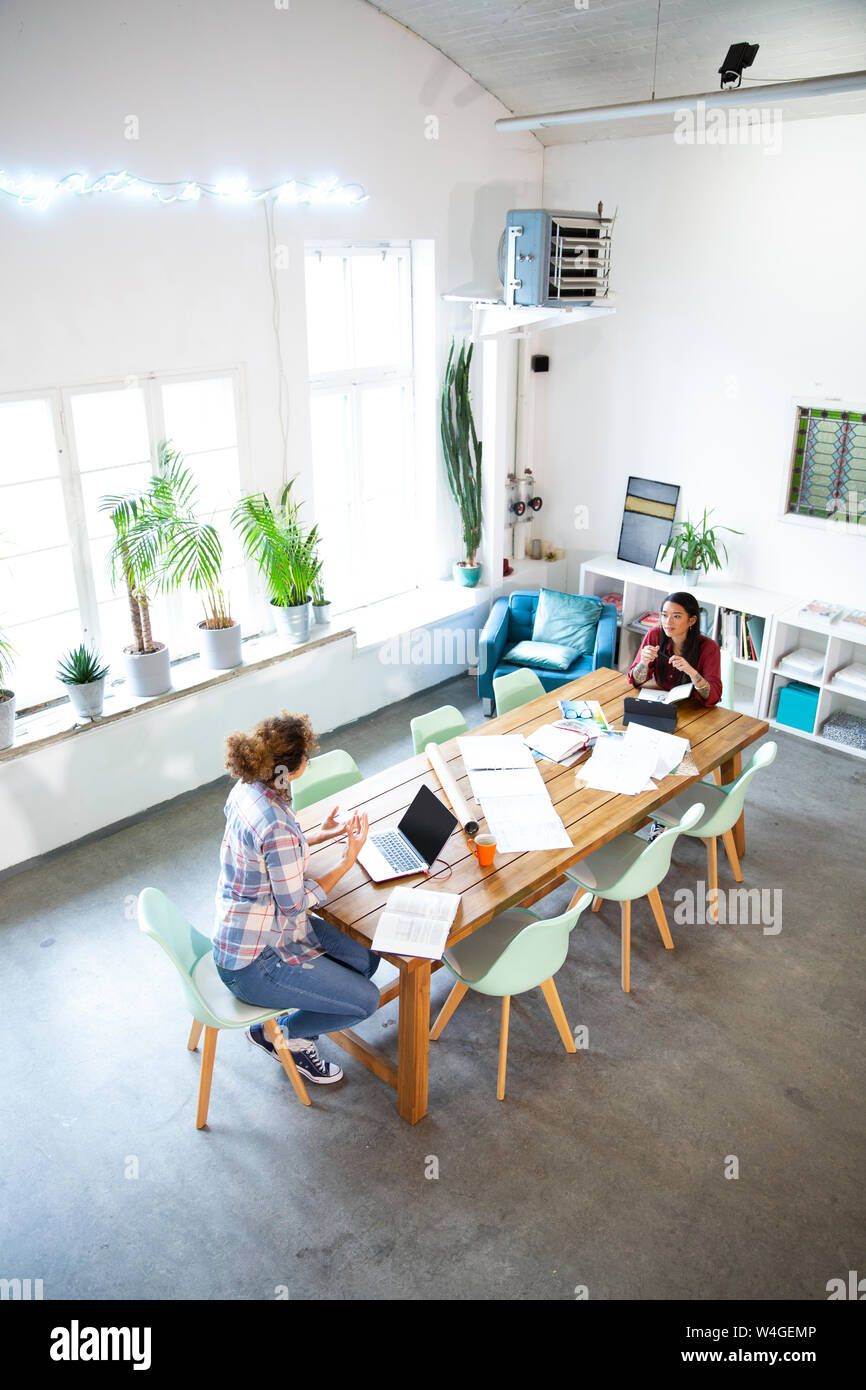 Two women at the table hi-res stock photography and images - Alamy