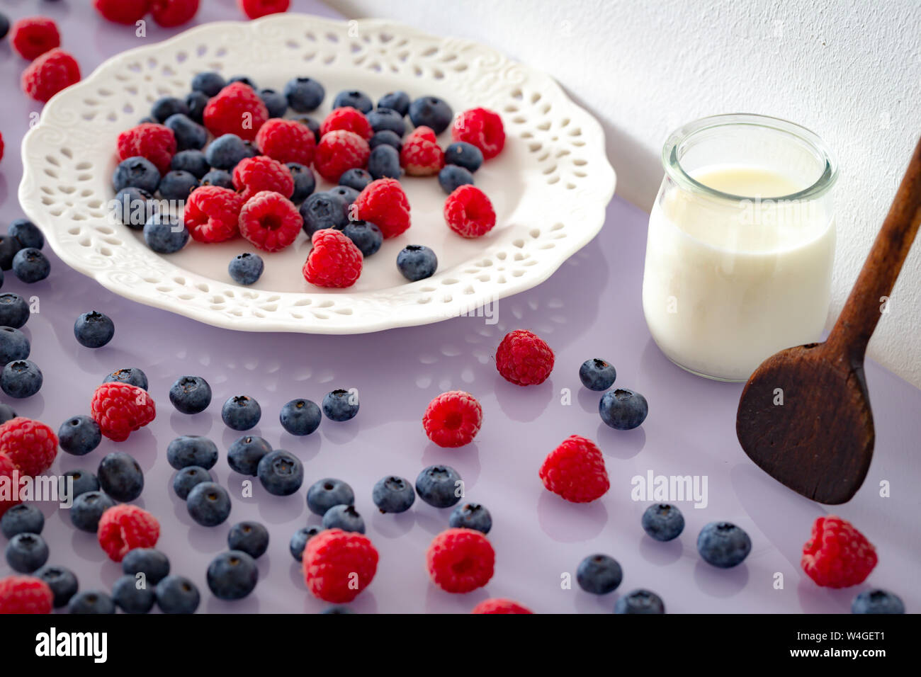 Seasonal fruits, blueberry and raspberry Stock Photo - Alamy