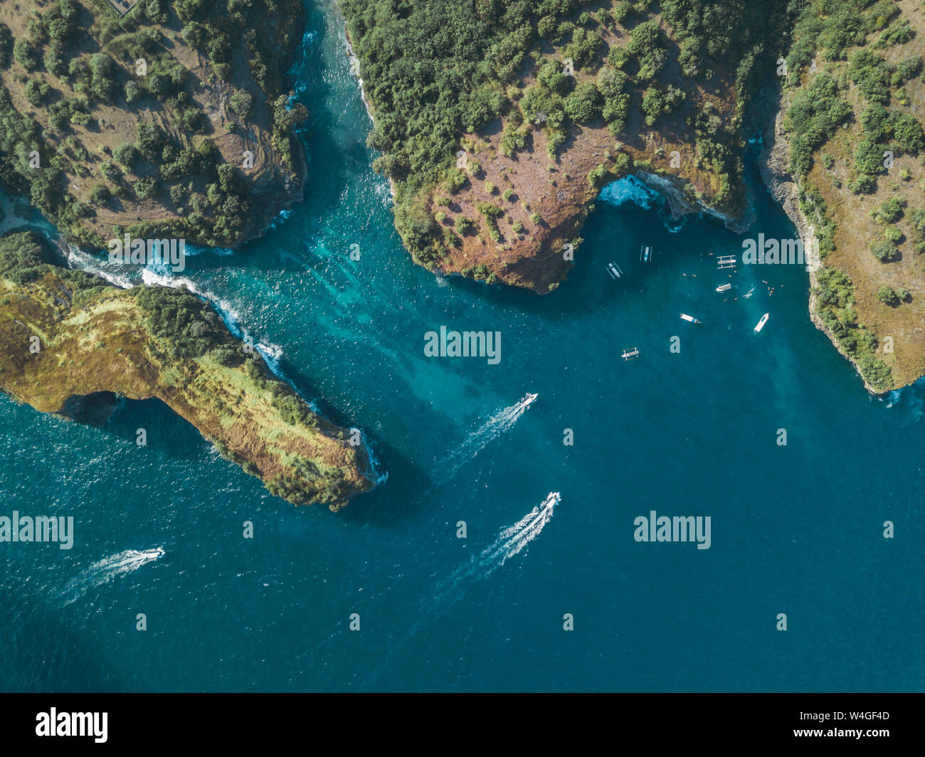 Aerial view of tourist boats at Manta bay, snorkeling tour,Nusa Penida ...