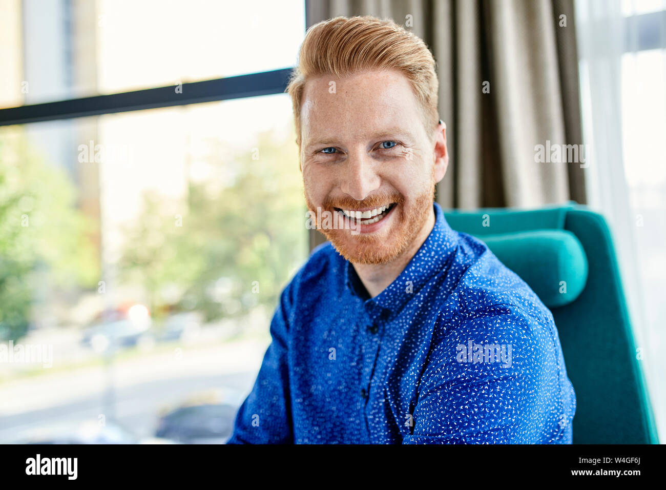Portrait of a happy man at home Stock Photo - Alamy