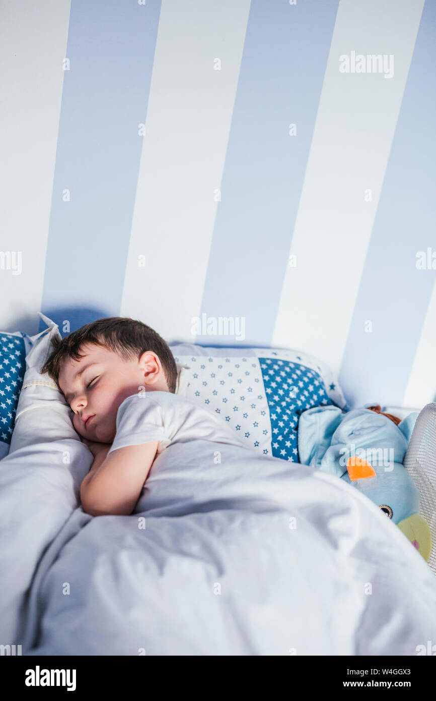 Boy make bed morning hi-res stock photography and images - Alamy