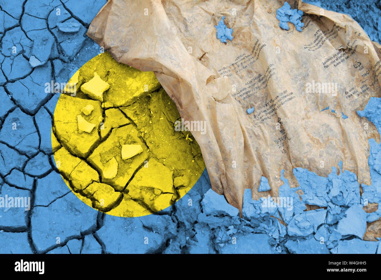 The flag of Palau, the flag is depicted on cracked earth. Ecology ...