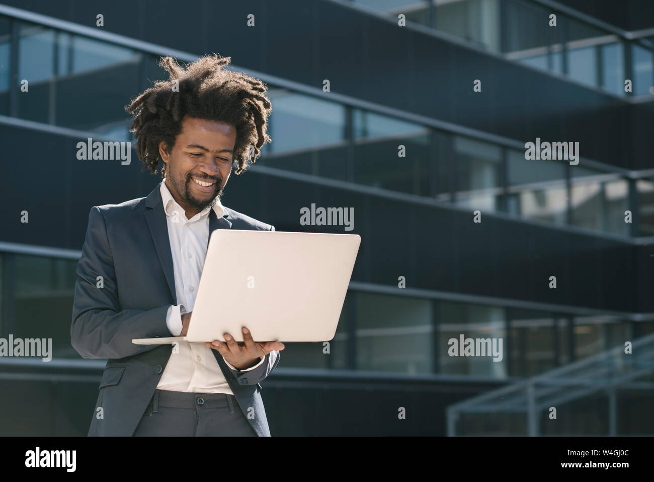 African laptop outside hi-res stock photography and images - Alamy