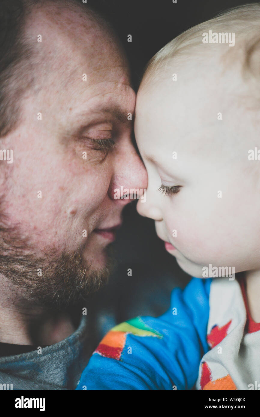 Father protecting child hi-res stock photography and images - Alamy