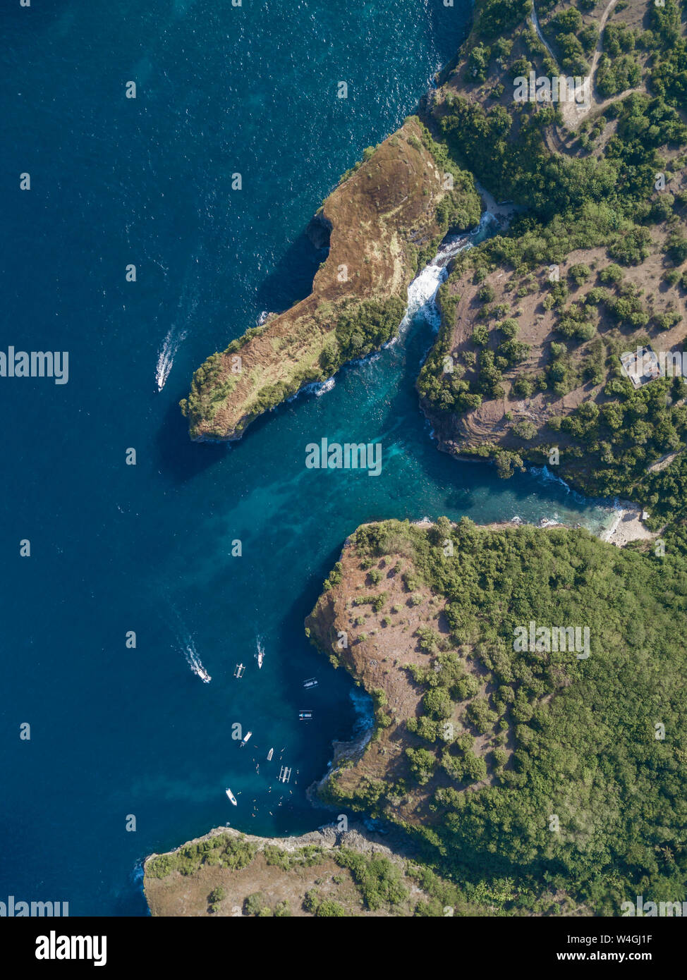 Aerial view of tourist boats at Manta bay, snorkeling tour,Nusa Penida ...