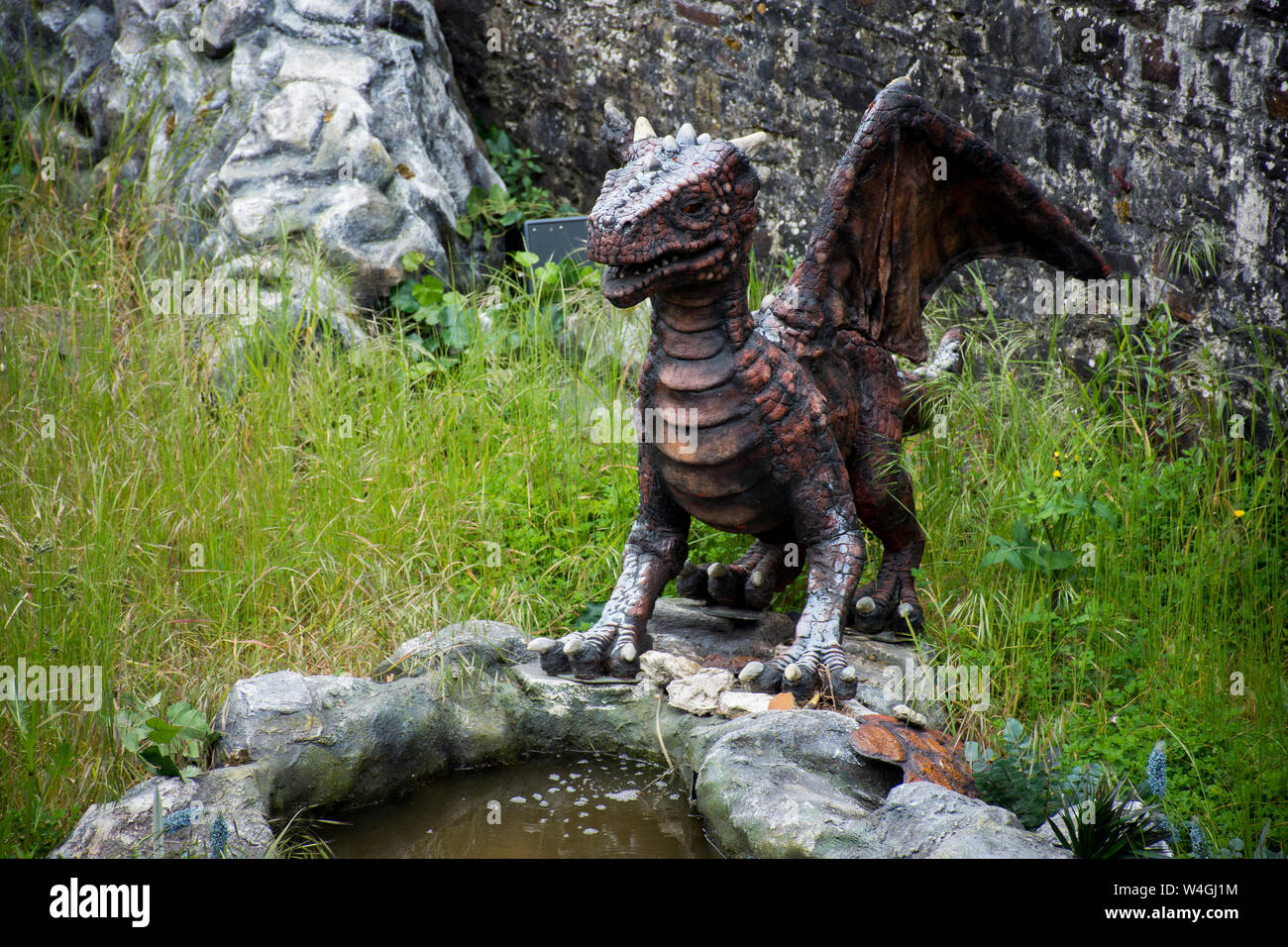 Welsh dragon miniature statues in a wales castle compound Stock Photo ...
