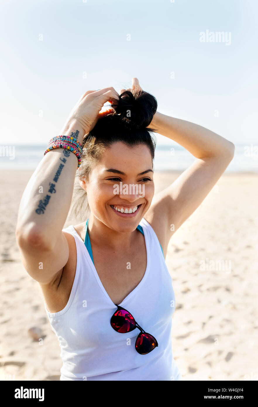 Portrait of a woman on beach hi-res stock photography and images - Alamy
