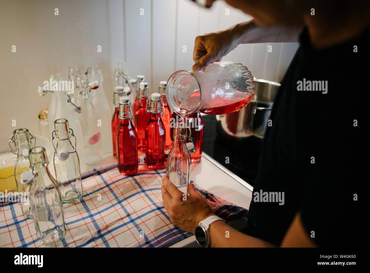 Filling up bottle hi-res stock photography and images - Alamy