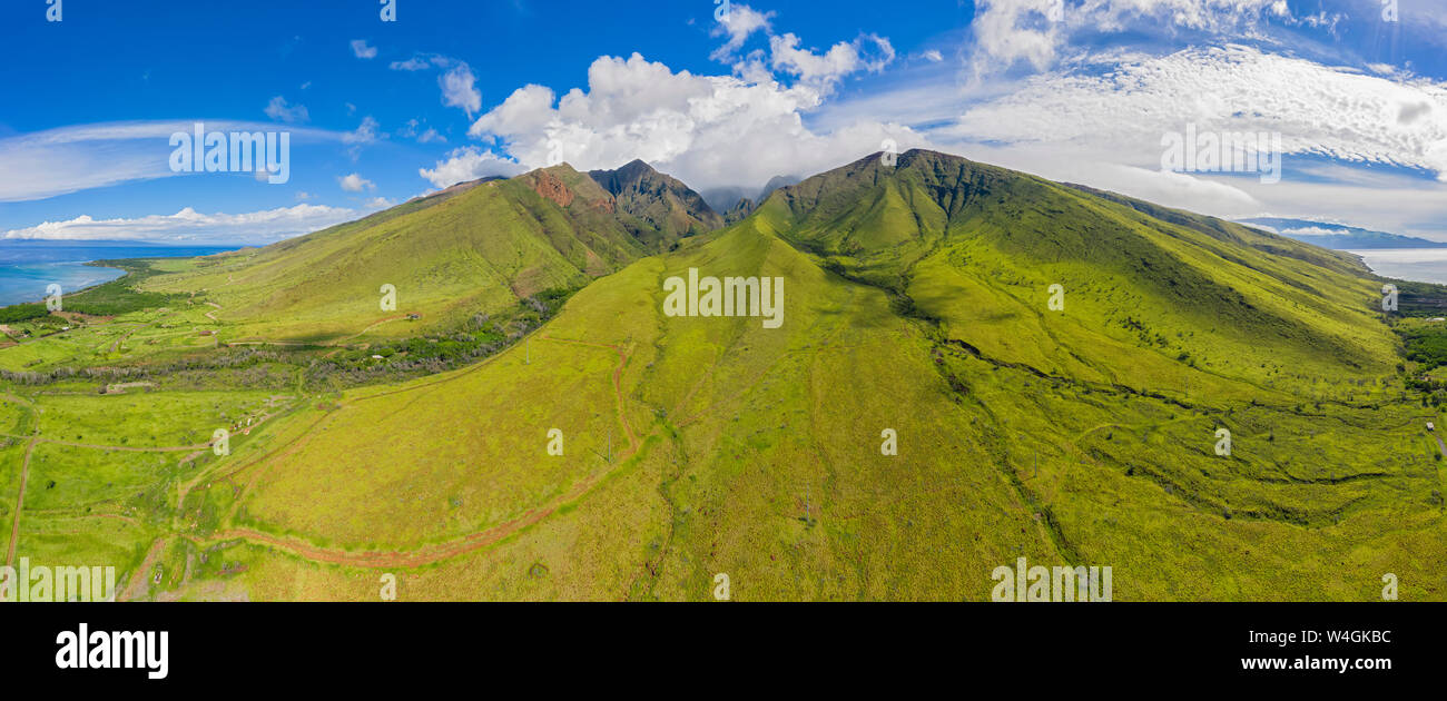 Aerial view over West Maui Mountains and Pacific Ocean with Puu Kukui ...