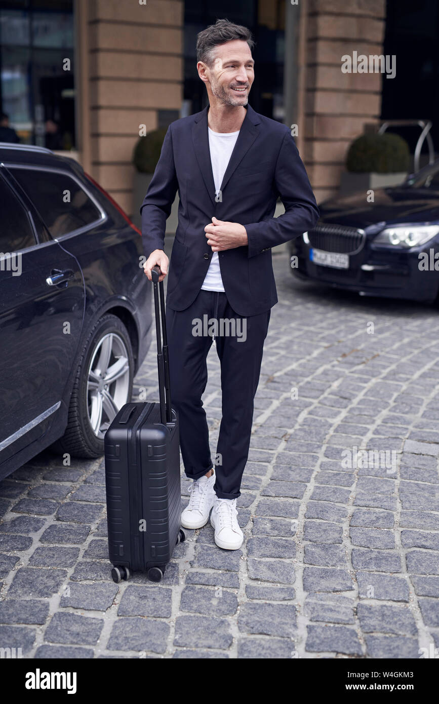 A man with trolley hi-res stock photography and images - Alamy