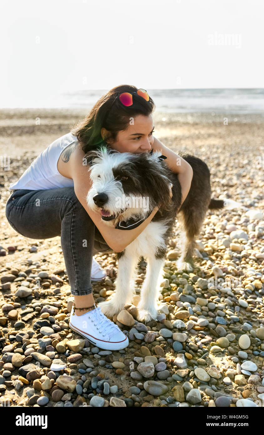Cuddling on beach hi-res stock photography and images - Alamy