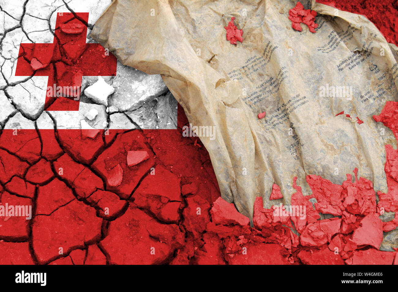 The flag of Tonga, the flag is depicted on cracked earth. Ecology ...