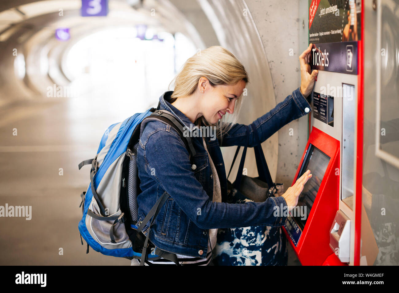 Person using train ticket machine hi-res stock photography and images ...