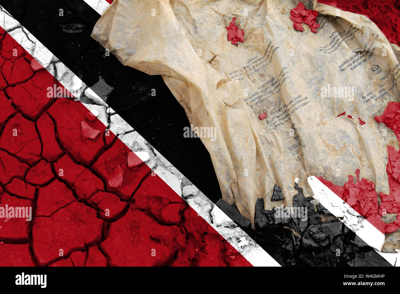 The flag of Trinidad and Tobago, the flag is depicted on cracked earth ...