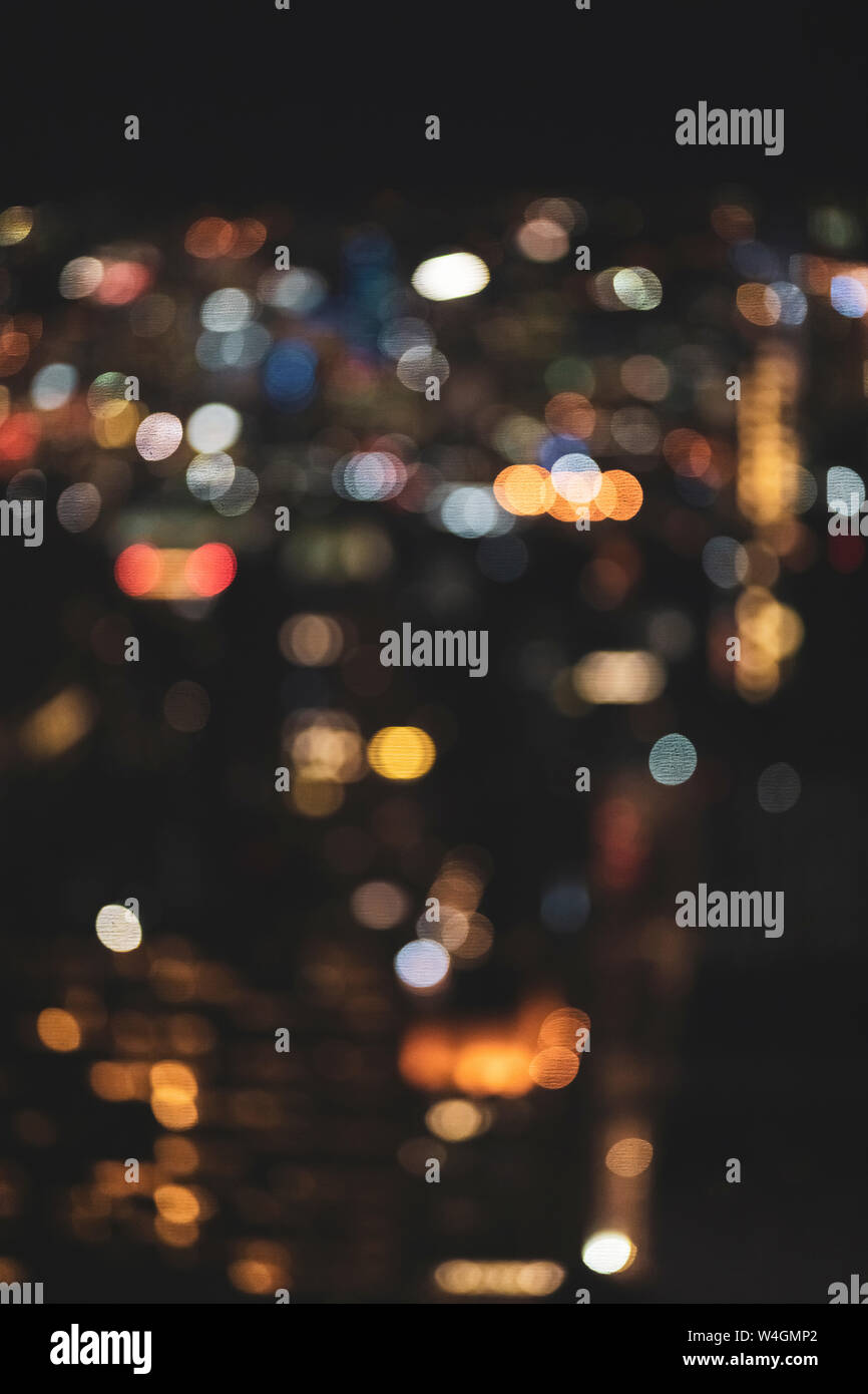 Defocused cityscape at night, Manhattan, New York City, USA Stock Photo ...