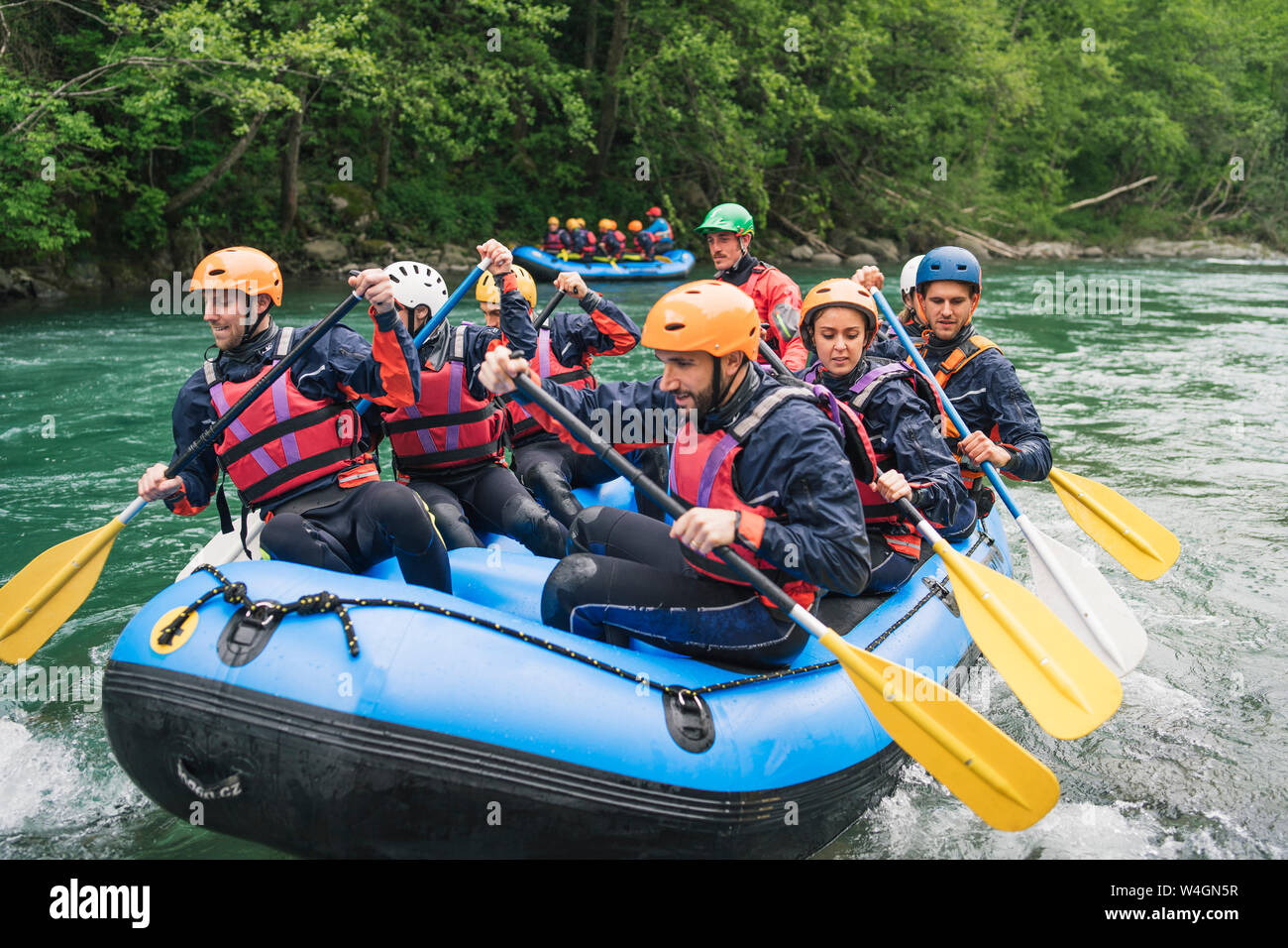 Men in rubber dinghy hi-res stock photography and images - Alamy