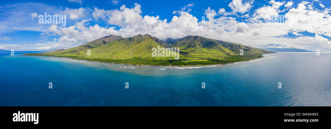 Aerial view over West Maui Mountains and Pacific Ocean with Puu Kukui ...