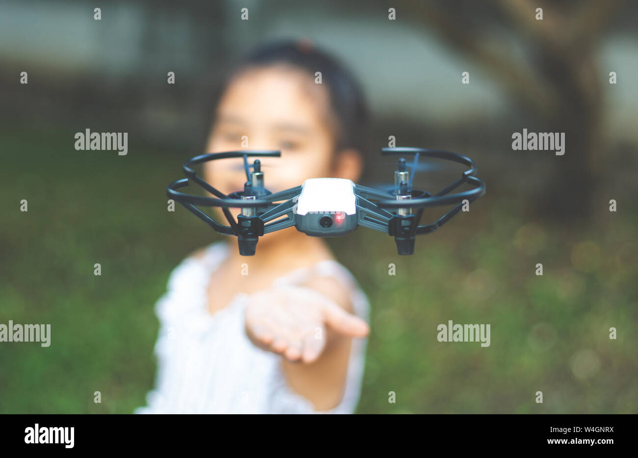 Child playing with drone outdoors at summer day Stock Photo - Alamy