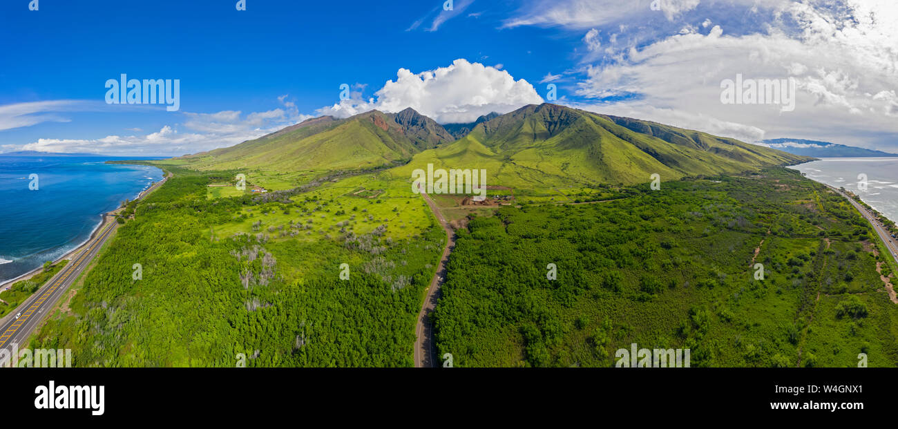 Aerial view over West Maui Mountains and Pacific Ocean with Puu Kukui ...