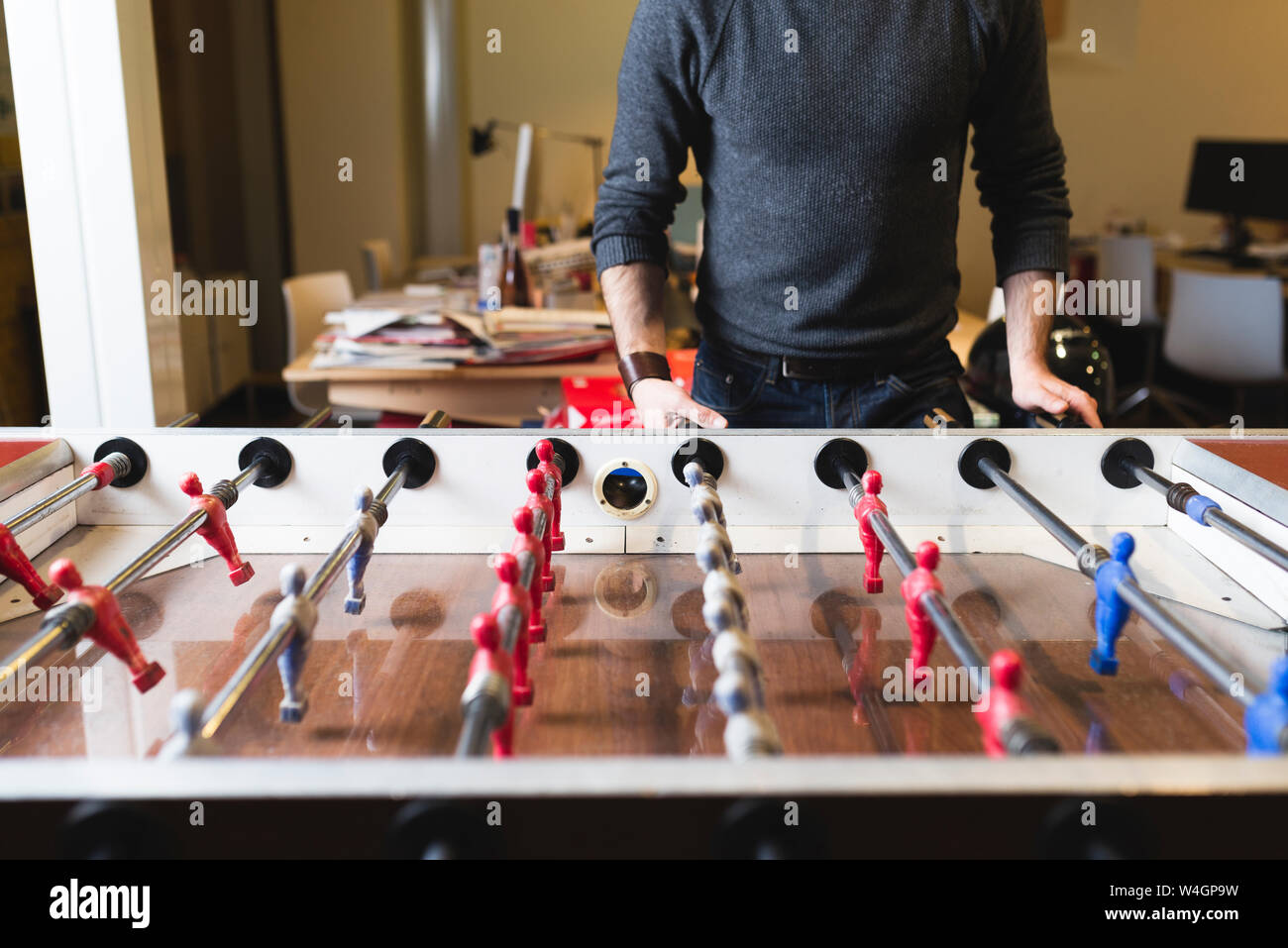 Playing table football in office hi-res stock photography and images ...