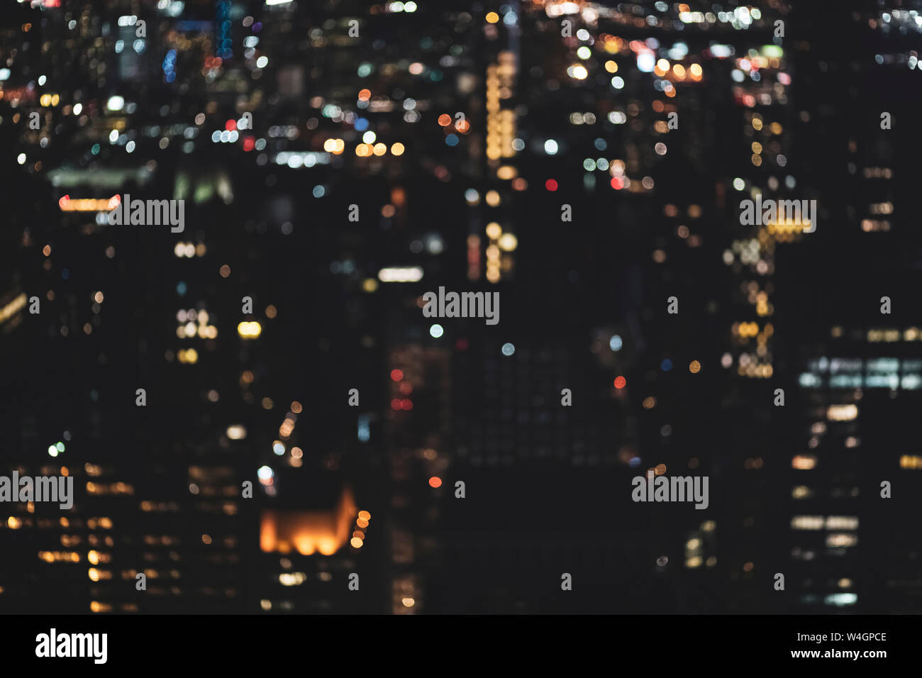 Defocused cityscape at night, Manhattan, New York City, USA Stock Photo ...